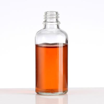 China 50ml/100ml Glass Perfume Bottle with CROWN CAP Sealing Type and Transparent Empty Design for sale
