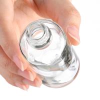 China 50ml/100ml Glass Perfume Bottle with CROWN CAP Sealing Type and Transparent Empty Design for sale