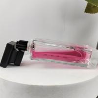China 30ml Trapezoidal Glass Spray Perfume Bottle with Eco-friendly Glass Body and Superior for sale