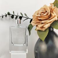 China Flat Square Glass Perfume Bottle 50ml 30ml 100ml Empty Bottle with Box Elegant Design for sale