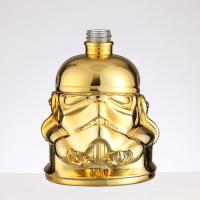 China Creative Golden Skull Vodka Shot Whiskey Decanter Glass Bottle with Screw Cap 200ml for sale