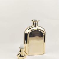 China Glass Base Material Aromatherapy Bottle 300ml Gold Electroplated Perfume Oil Bottle for sale