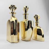 China Glass Base Material Aromatherapy Bottle 300ml Gold Electroplated Perfume Oil Bottle for sale