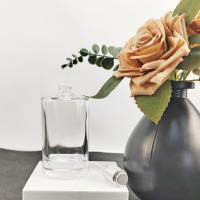 China 50ml 100ml Transparent Square Perfume Glass Bottle with Hot Stamping Surface Handling for sale