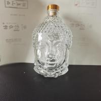 China Hot Stamping Surface Handling Glass Skull Bottle with Stopper 700ml 750ml Transparent for sale