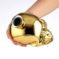 China Rubber Stopper Skull Shape Glass Bottles Golden Electroplate Luxury Wine Customized Logo for sale