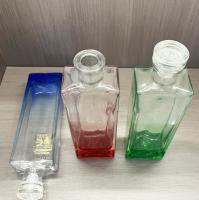 China 500ml 700ml Round Shape Glass Whiskey Bottle for Mountain Wine Vodka and Gin Customized for sale