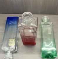 China 500ml 700ml Round Shape Glass Whiskey Bottle for Mountain Wine Vodka and Gin Customized for sale