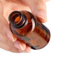China 10ml 20ml 30ml Brown Essential Oil Glass Bottle with Bamboo Cover Base Material Glass for sale
