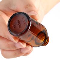 China 10ml 20ml 30ml Brown Essential Oil Glass Bottle with Bamboo Cover Base Material Glass for sale