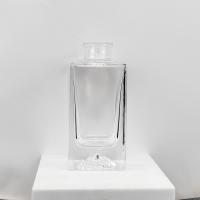 China Aromatherapy Square Glass Bottle with Wooden Lid 50ml Capacity and Clear Glass for sale