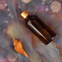 China 10ml 20ml 30ml Brown Essential Oil Glass Bottle with Bamboo Cover Base Material Glass for sale