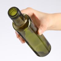 China Customer's Choice 500ml Cylindrical Green Condiment Glass Bottles for Olive Oil 250ml for sale