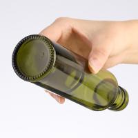 China Customer's Choice 500ml Cylindrical Green Condiment Glass Bottles for Olive Oil 250ml for sale