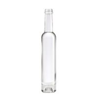 China Clear 750ml Tequila Empty Wine Bottle with Lid and Hot Stamping Surface Handling Tesla for sale