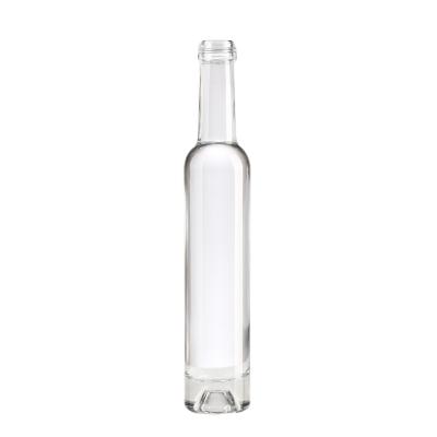 China Clear 750ml Tequila Empty Wine Bottle with Lid and Hot Stamping Surface Handling Tesla for sale