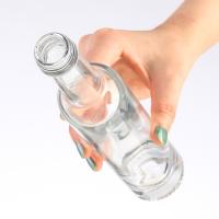 China Clear 750ml Tequila Empty Wine Bottle with Lid and Hot Stamping Surface Handling Tesla for sale