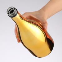 China Glass Body Custom Design 700ml 750ml Extra Flint Metallic Gold Champagne Bottle with Cork for sale
