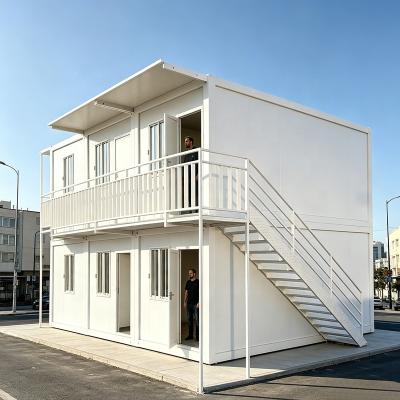 China 20ft Flat Pack Container House Low Sea Freight Cost Reusable Prefab Sandwich Panel Waterproof Fireproof School Living Room for sale