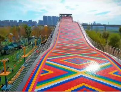 China Outdoor Rainbow Slide for Playgrounds Durable All-Ages Fun for sale