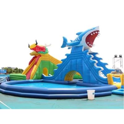 China 14*18m Inflatable Water Park with 1200w Blower and 1-20 People Capacity Dragon Shark Slide and Large Swimming Pool for sale