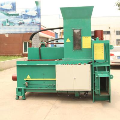 China sawdust baler banding machine,sawdust bale strapping machine for sale