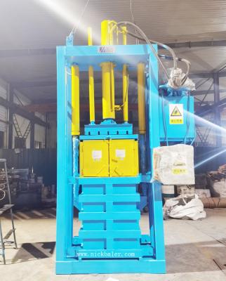 China Double chambers clothes baler used clothes baling machine used towels compactor with factory price for sale
