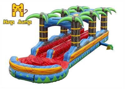 China 2000N/50mm backyard Wet And Dry Inflatable Slide With Tropical Tree for sale