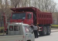 China 10 Wheels 70 Ton Dump Truck With Unilateral High Strength Skeleton Cab for sale