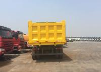 China Heavy Duty Sinotruk Howo Tipper Truck 6X4 30 - 40 Tons Ventral Lifting Radial Tire for sale