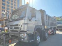 China RHD 8×4 12wheels High Horsepower HOWO 26CBM Tipper Truck 380HP Low Fuel Consumption for sale
