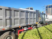China RHD 8×4 12wheels High Horsepower HOWO 26CBM Tipper Truck 380HP Low Fuel Consumption for sale