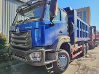 China Full DriveLow Fuel Consumption 380HP Blue HOWO Tipper Truck RHD 6×6 10wheels for sale