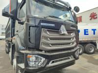 China HOWO NX 380HP RHD Black Tipper Dump Truck With Tarpaulin Flap for sale