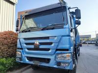 China Captivating Blue HOWO 8×4 380HP 26.91CBM Dump Truck Where Power Meets Precision In Every Load! for sale