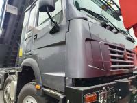 China 400HP HOWO 8*4 Dump Truck (Black): Featuring U-Shaped Hopper & Ghost-Face Cab for sale