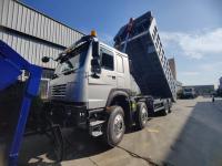 China SINOTRUK HOWO 8×4 Dump Truck 400HP + 7800mm Rear Double Door Cargo Box for sale