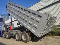 China SINOTRUK HOWO 8×4 Dump Truck 400HP + 7800mm Rear Double Door Cargo Box for sale