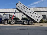 China SINOTRUK HOWO 8×4 Dump Truck 400HP + 7800mm Rear Double Door Cargo Box for sale