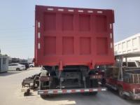 China Sinotruk NX Tipper Dump Truck with 371HP Engine, 40-50T Capacity and 8×4 Drive for Heavy-Duty Transport Red for sale