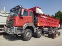 China Sinotruk NX Tipper Dump Truck with 371HP Engine, 40-50T Capacity and 8×4 Drive for Heavy-Duty Transport Red for sale