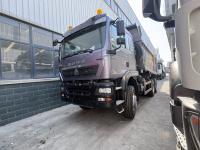 China SINOTRUK HOWO TX Model 371HP LHD Tipper Dump Truck 6X4 With Warning lights U type Grey Color for sale