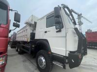 China SINOTRUK HOWO Ghost Face Cab 380HP LHD Tipper Dump Truck 6X4 White for sale