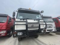 China SINOTRUK HOWO Ghost Face Cab 380HP LHD Tipper Dump Truck 6X4 White for sale