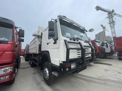 China SINOTRUK HOWO Ghost Face Cab 380HP LHD Tipper Dump Truck 6X4 White for sale