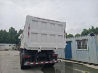 China HOWO 8X4 380HP NX Tipper Dump Truck With Tarpaulin Flap RHD for sale