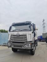 China HOWO 8X4 380HP NX Tipper Dump Truck With Tarpaulin Flap RHD for sale