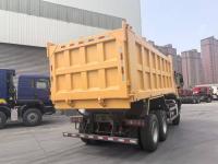 China HOWO 6×4 Yellow Tipper Truck, 40T Load Capacity, High Impact-Resistant Material, Built for African Road Conditions for sale