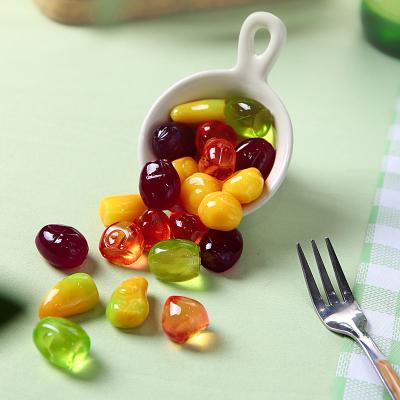 China Sweet Fruit Shaped Soft Gummy Candy Juice Peeling Jelly Candy Mango Sweets for sale