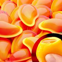 China OEM Bulk Filled Gummy Balls Mango Shape Soft  Halal Certified Fruit Soft Candy for sale